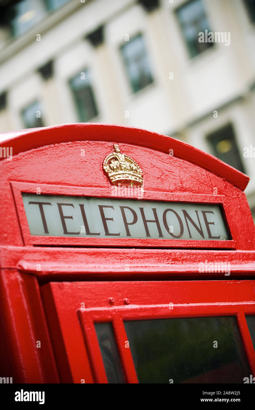 Close-up detail view of traditional red English telephone box with ...