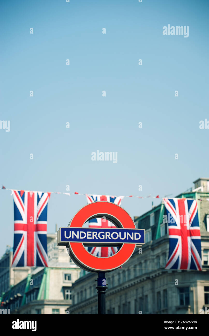 LONDON - MAY 24, 2012: British Union Jack flags complement the iconic ...