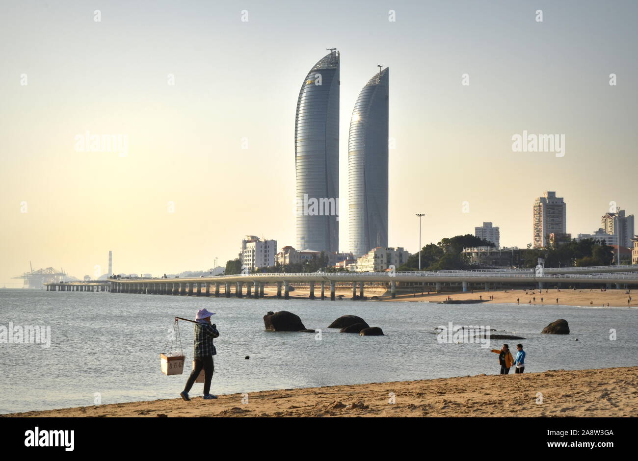 Xiamen modern city skyline and Baicheng beach seller, Fujian, China ...