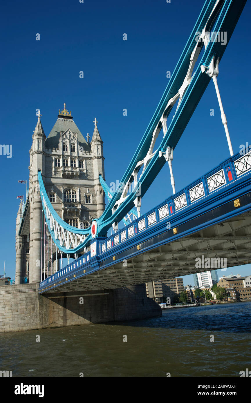 Bright sunny daytime view of Tower Bridge with blue sky above the River ...