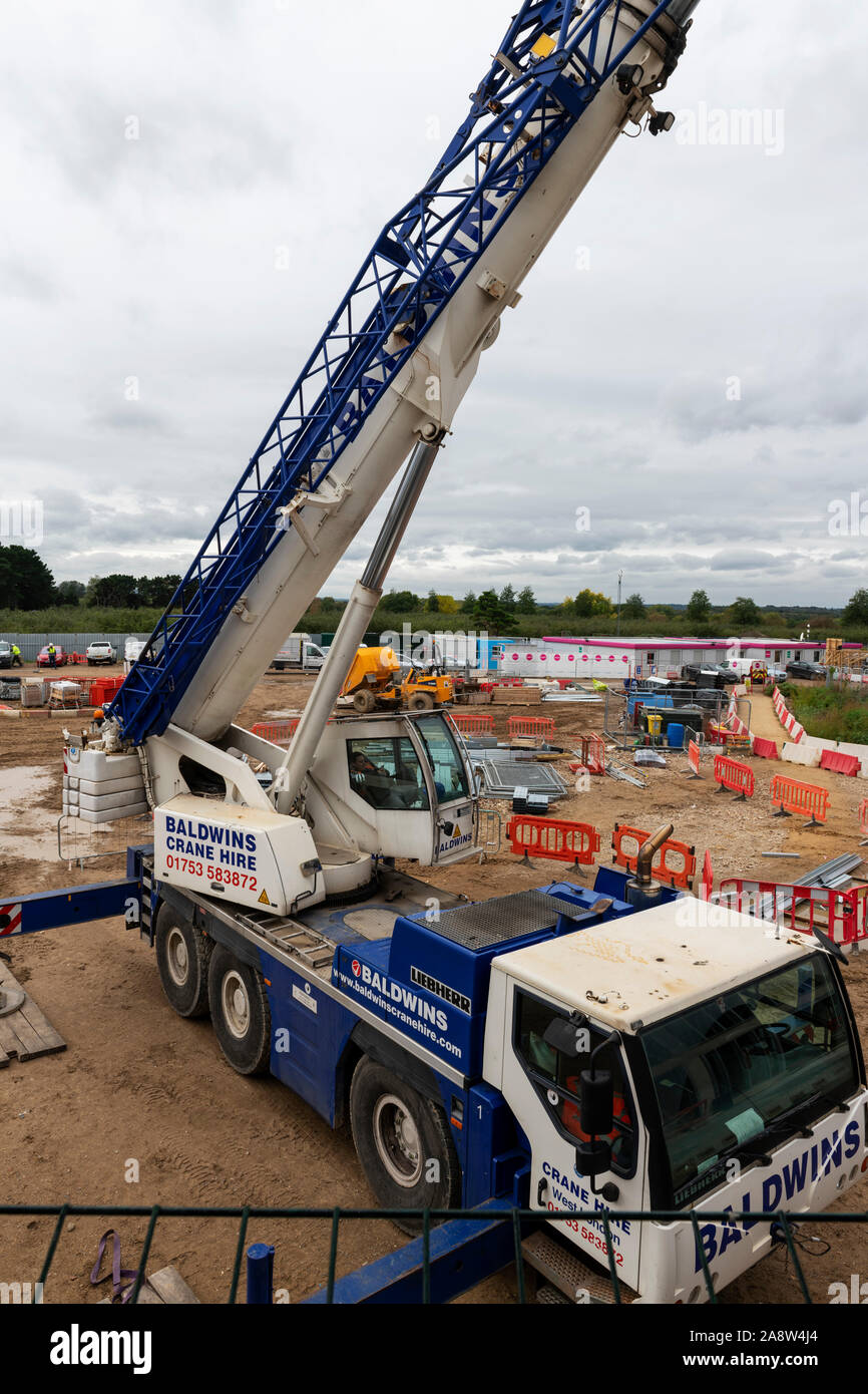 Mobile crane on building site Stock Photo - Alamy