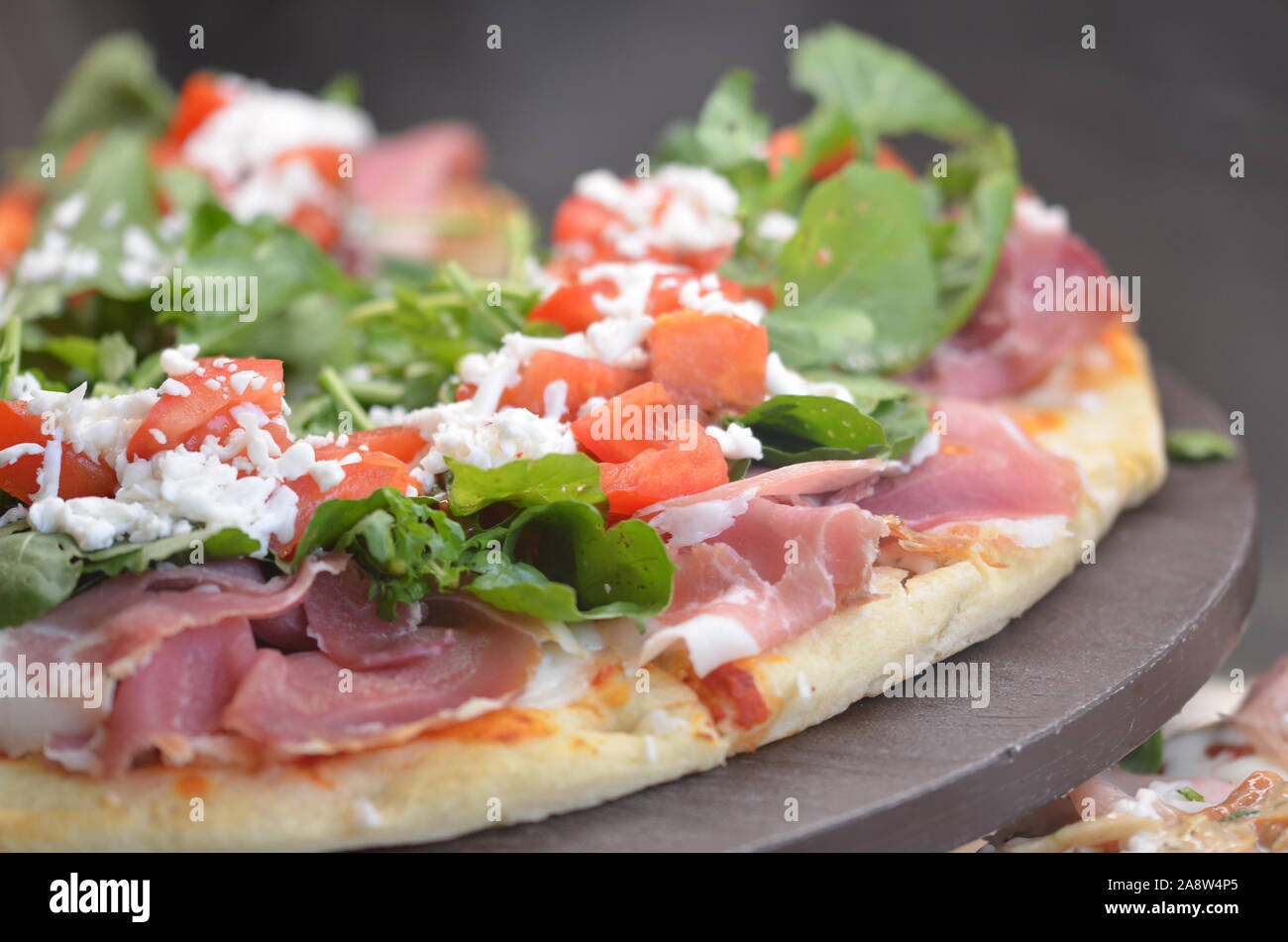 tasty italian pizza dish close up view - with fresh ingredients Stock ...