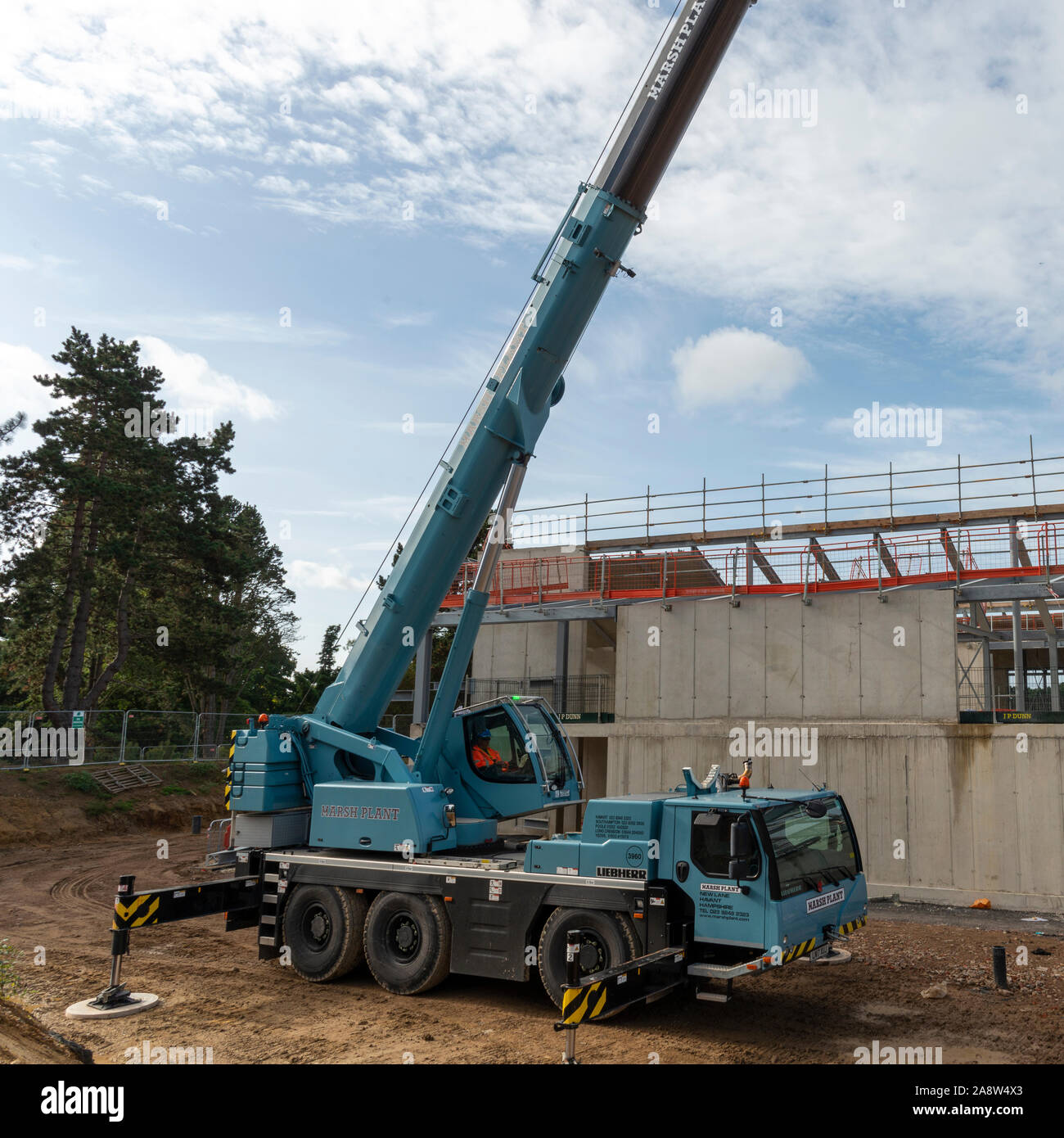 Mobile crane on building site Stock Photo - Alamy
