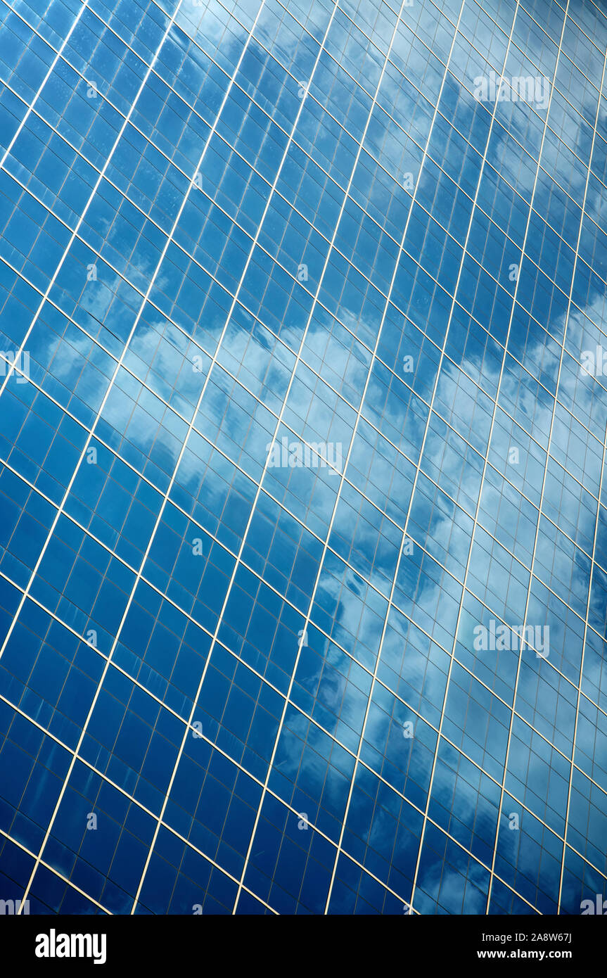 Modern business background of puffy white clouds reflecting on grid of ...