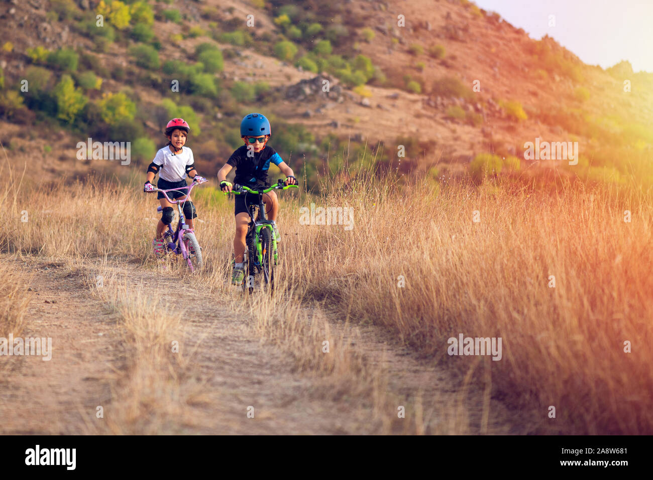 Boy on bicycle wearing helmet hi-res stock photography and images - Alamy