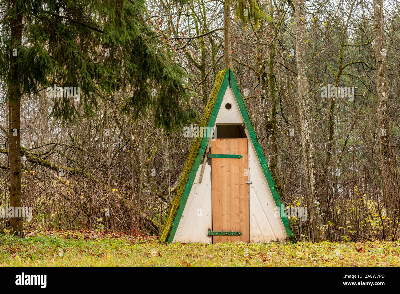 Outdoor toilet in the forest during autumn season Stock Photo - Alamy