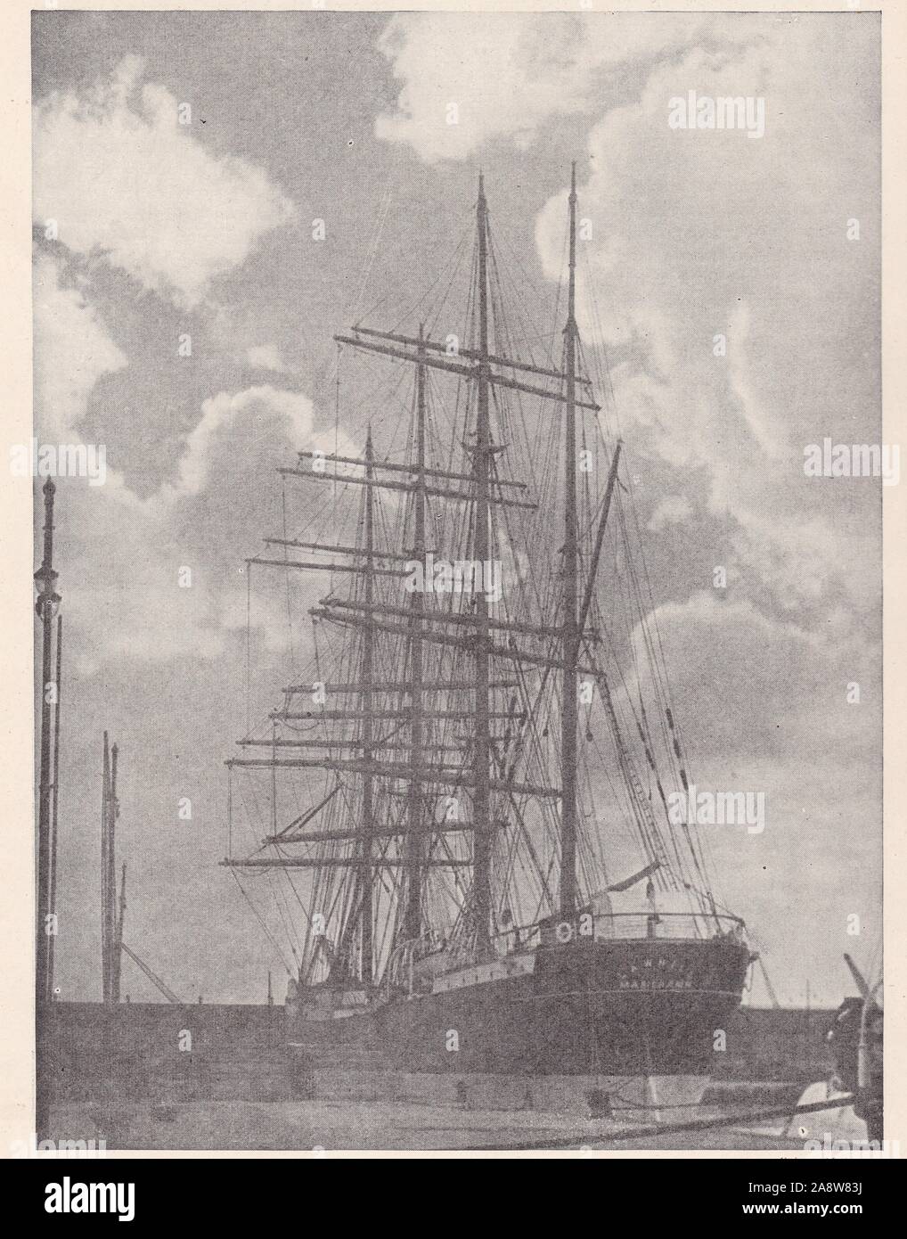 Windjammer sailing ship with sails furled in a British port 1940s ...
