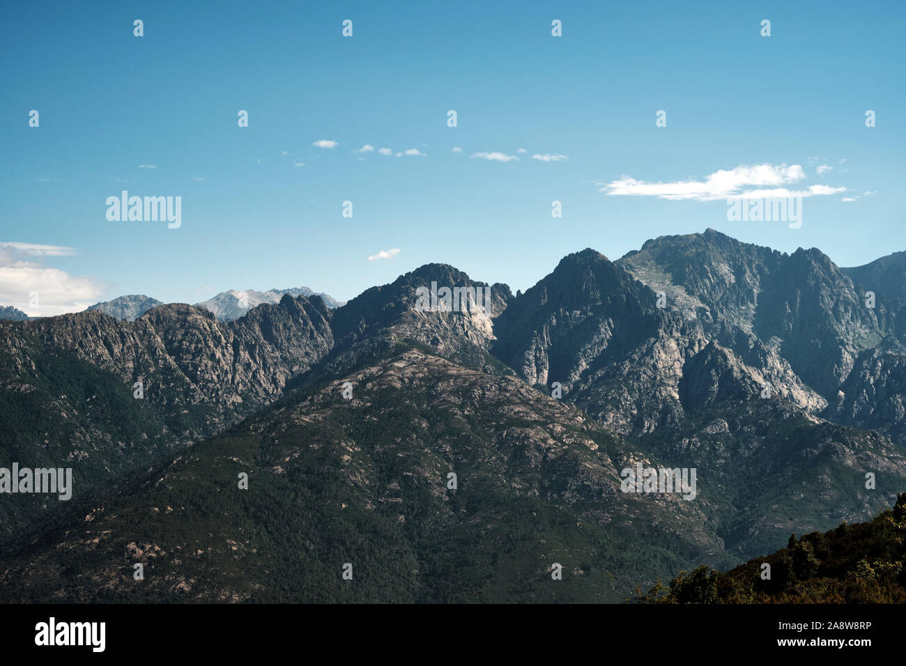 The granite mountain peaks of the upper Gravona Valley near Bocognano ...