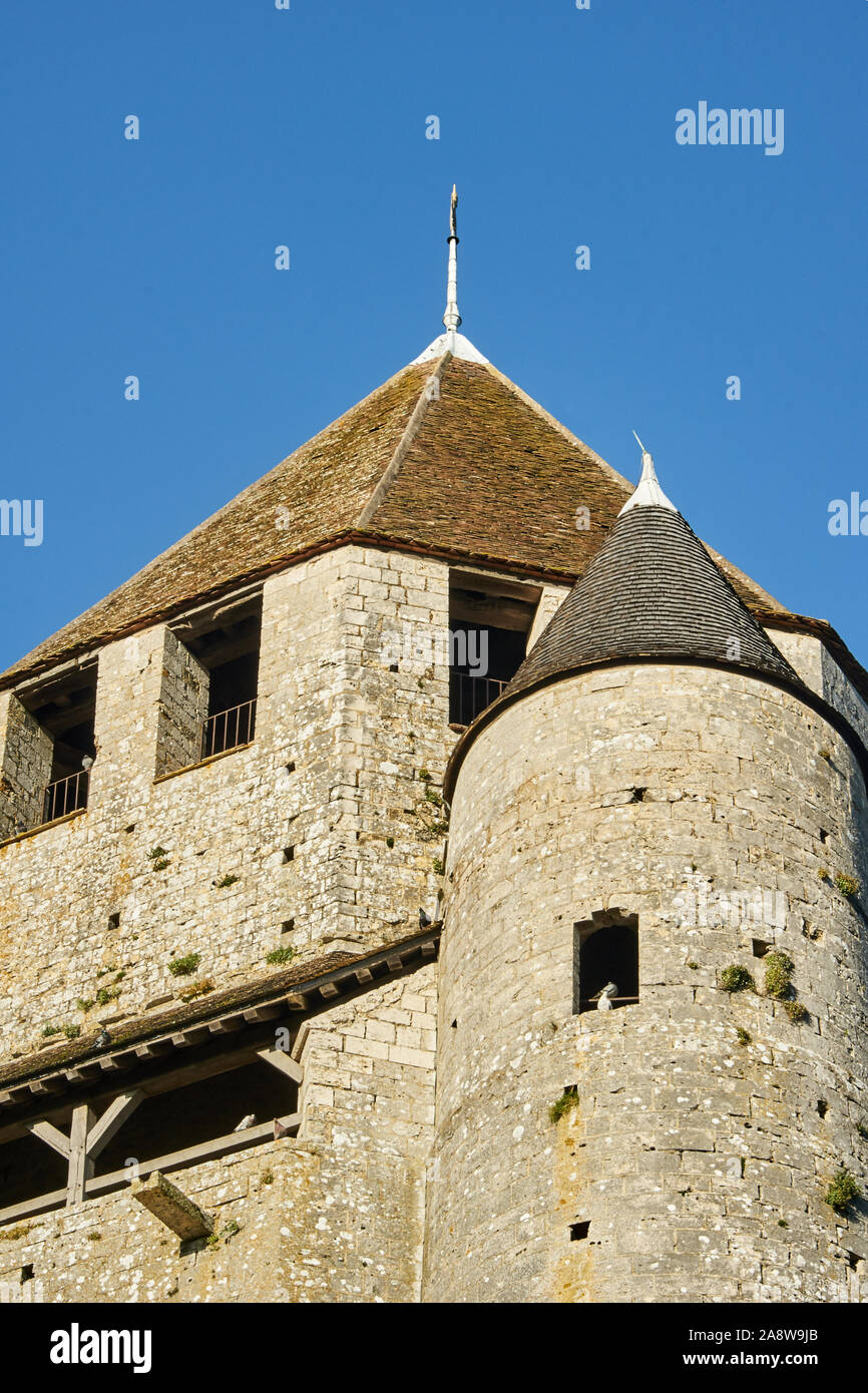Stone walls and towers of a medieval castle in the town of Provins ...