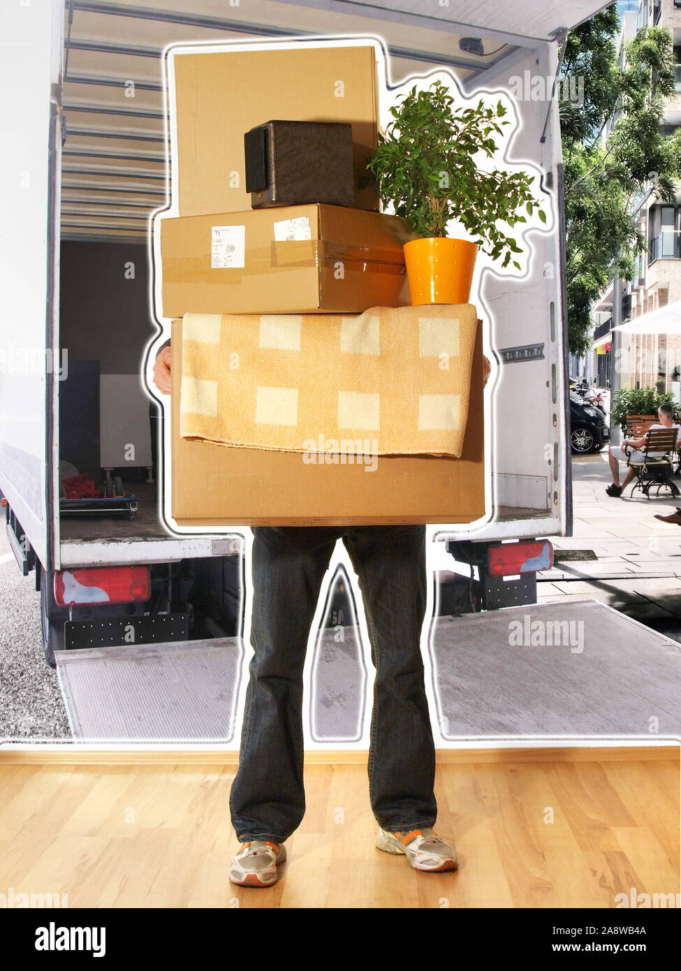 Man carrying brown boxes hi-res stock photography and images - Alamy