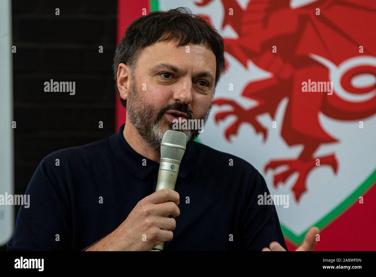 Cardiff, Wales 11/11/19. Curator Simon Shakeshaft speaks at the FAW ...