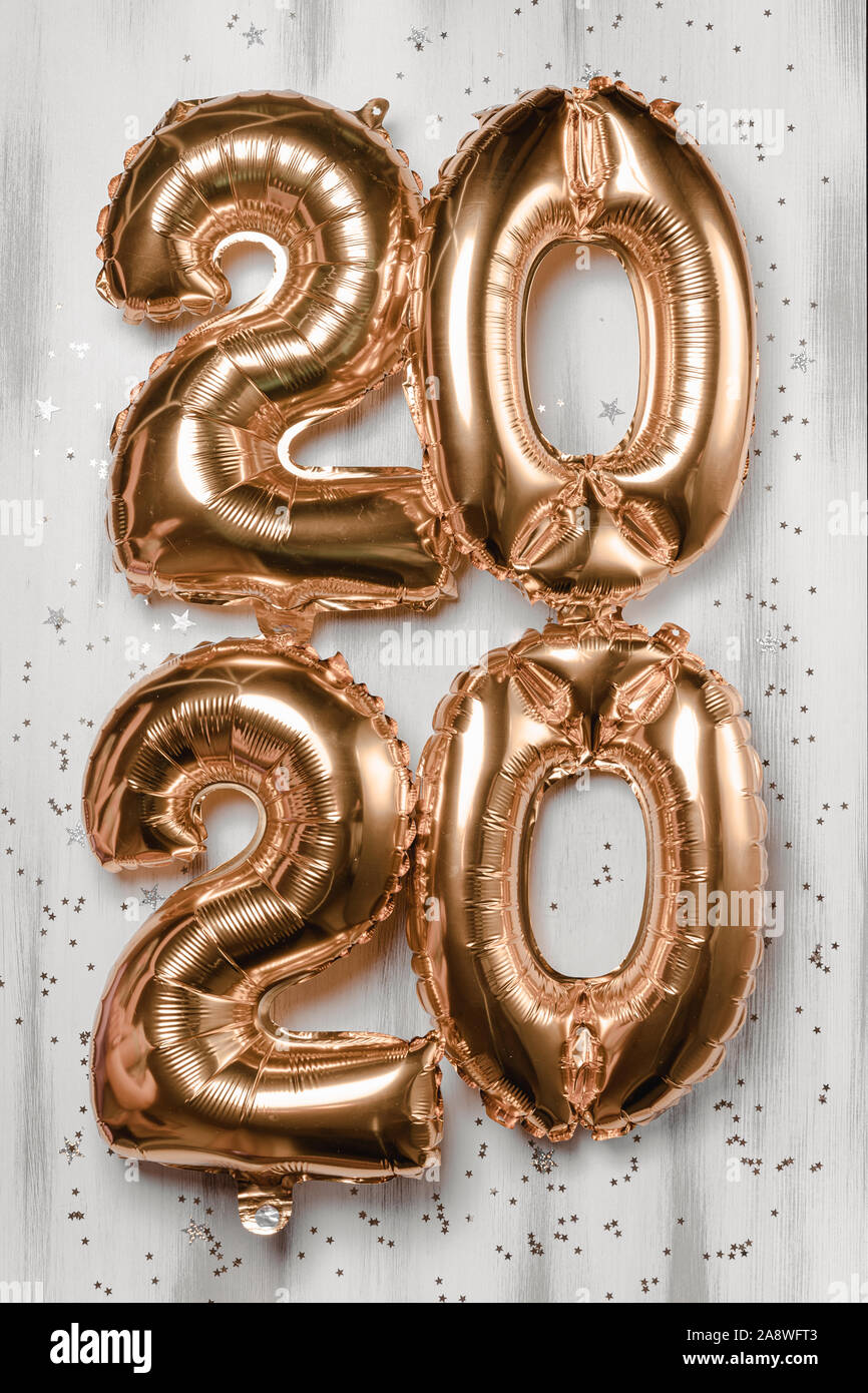 Happy New year 2020 celebration. Bright gold balloons figures, New Year ...