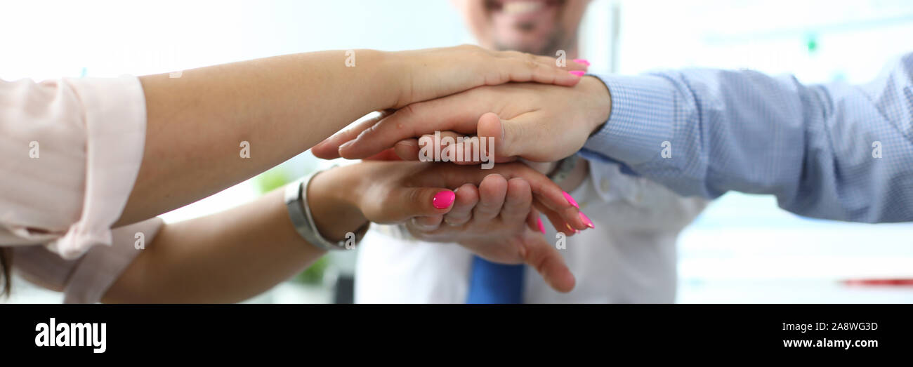 Team signing important contract Stock Photo - Alamy