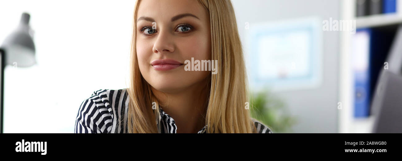 Beautiful smiling female ceo at worktable looking in camera Stock Photo ...