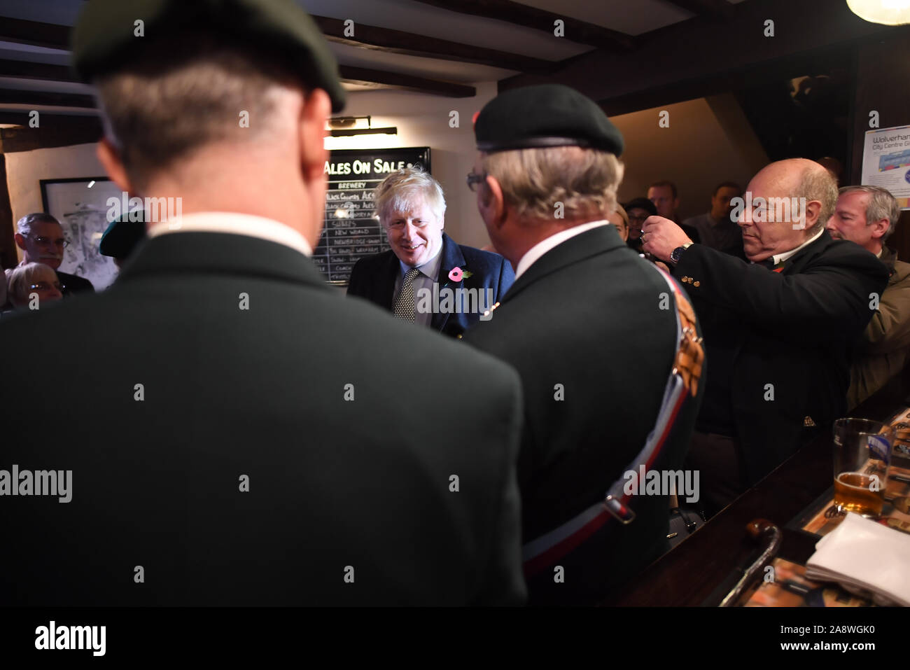 Prime Minister Boris Johnson (centre) meets with military veterans at ...