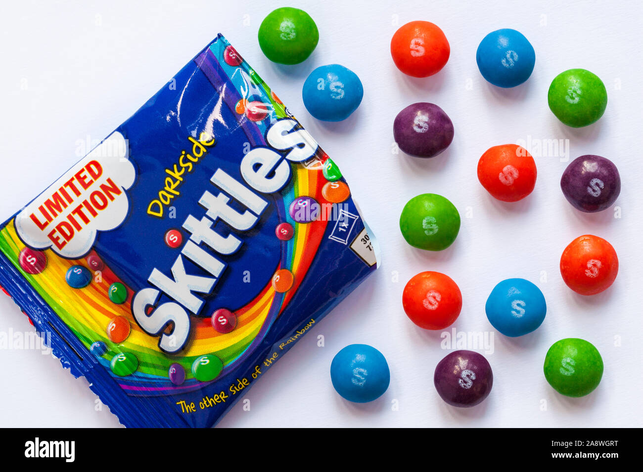 Packet of Dark Side Skittles sweets candy limited edition opened with ...