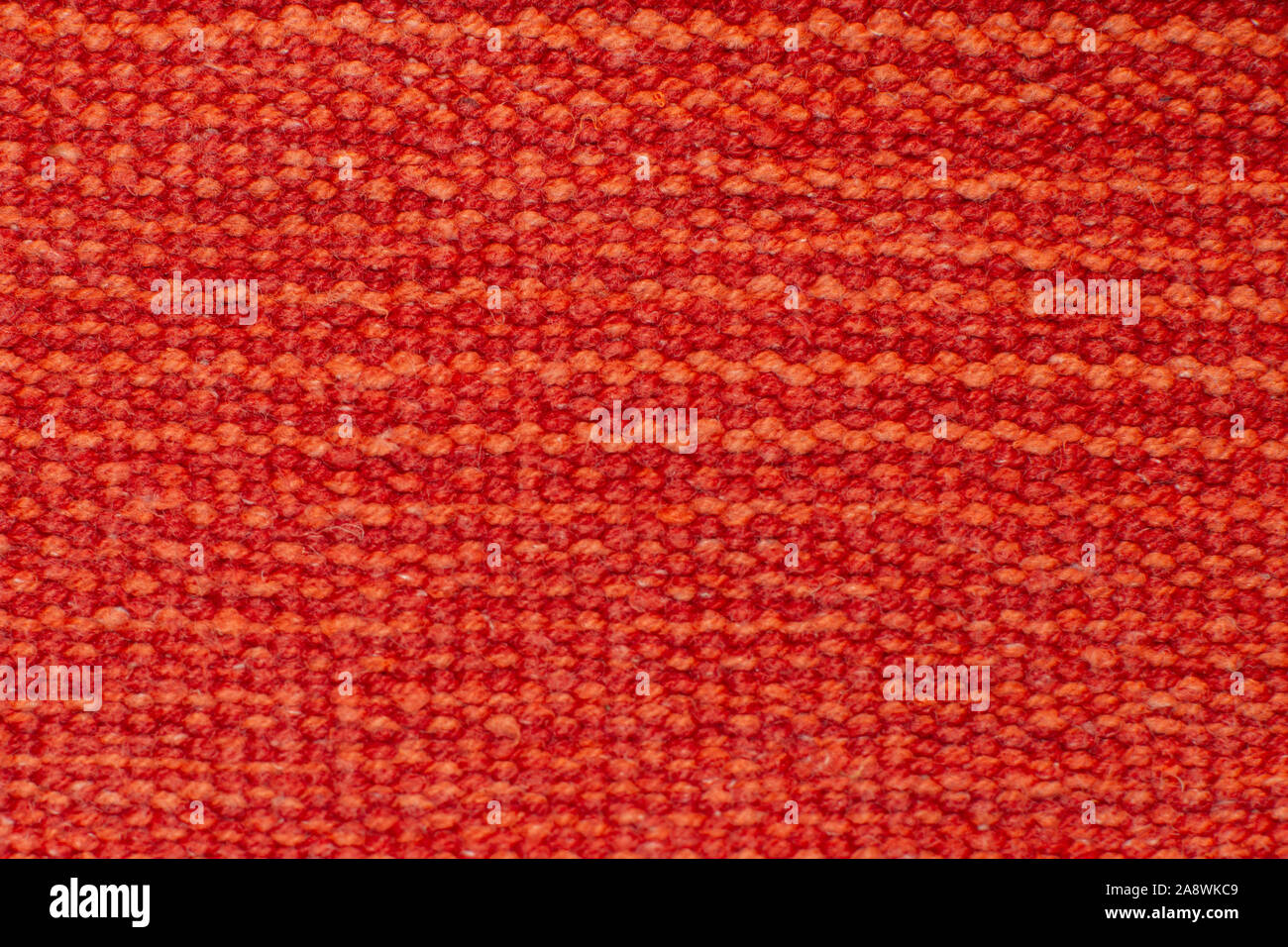 Red fabric texture with orange lines background Stock Photo - Alamy