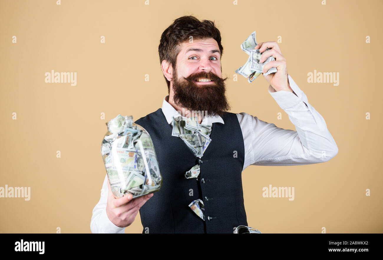 Security and cash money savings. Banking concept. Man bearded guy hold ...