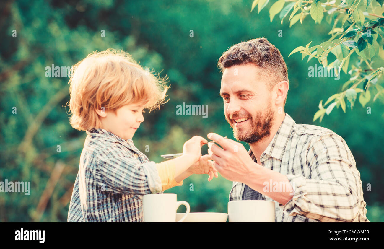 Feeding son natural foods. Stage of development. Feed son solids. Dad ...