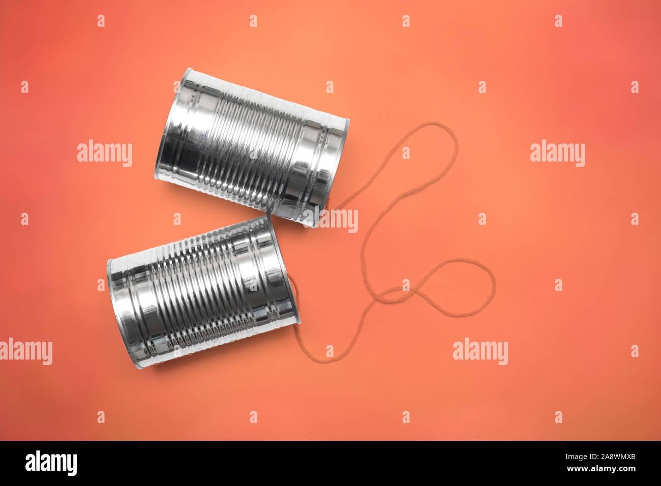 Communications and business calls concept of tin can telephone with ...