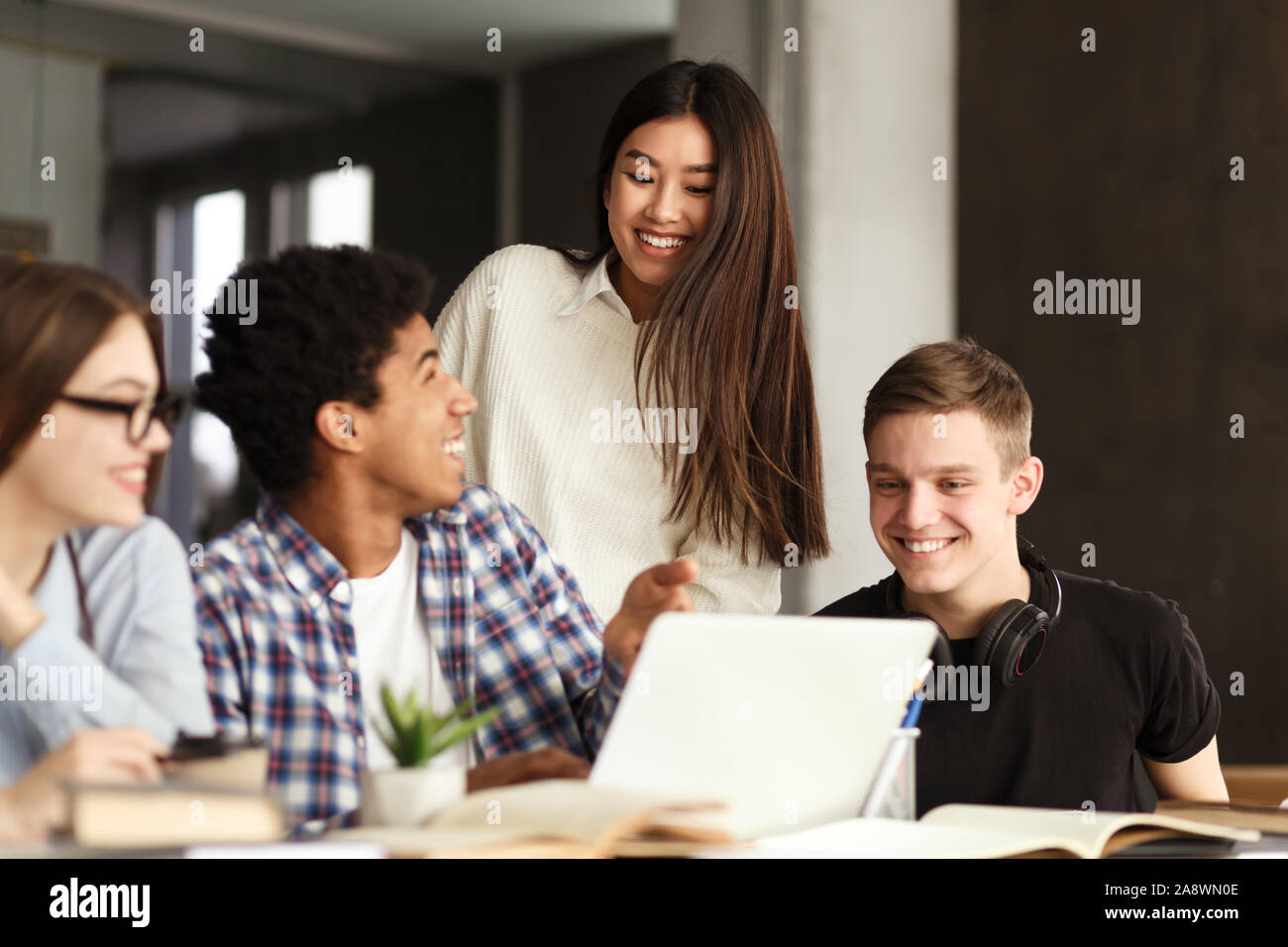 Smart student girl sharing her creative ideas with classmates Stock ...