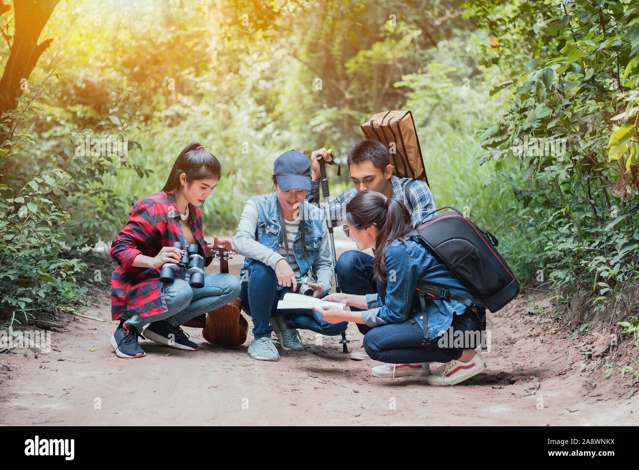 Hiking trail in the forest with friends. Walk Through Countryside and ...
