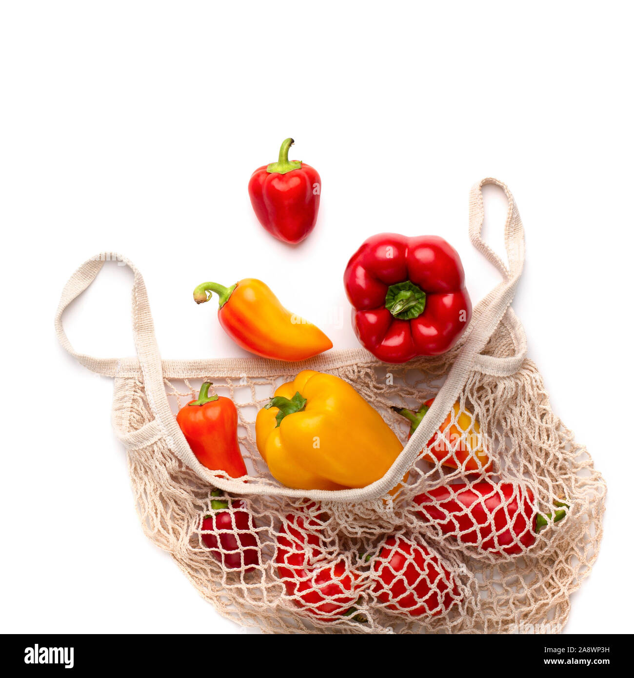 Fresh paprika in Eco natural bag on white Stock Photo - Alamy
