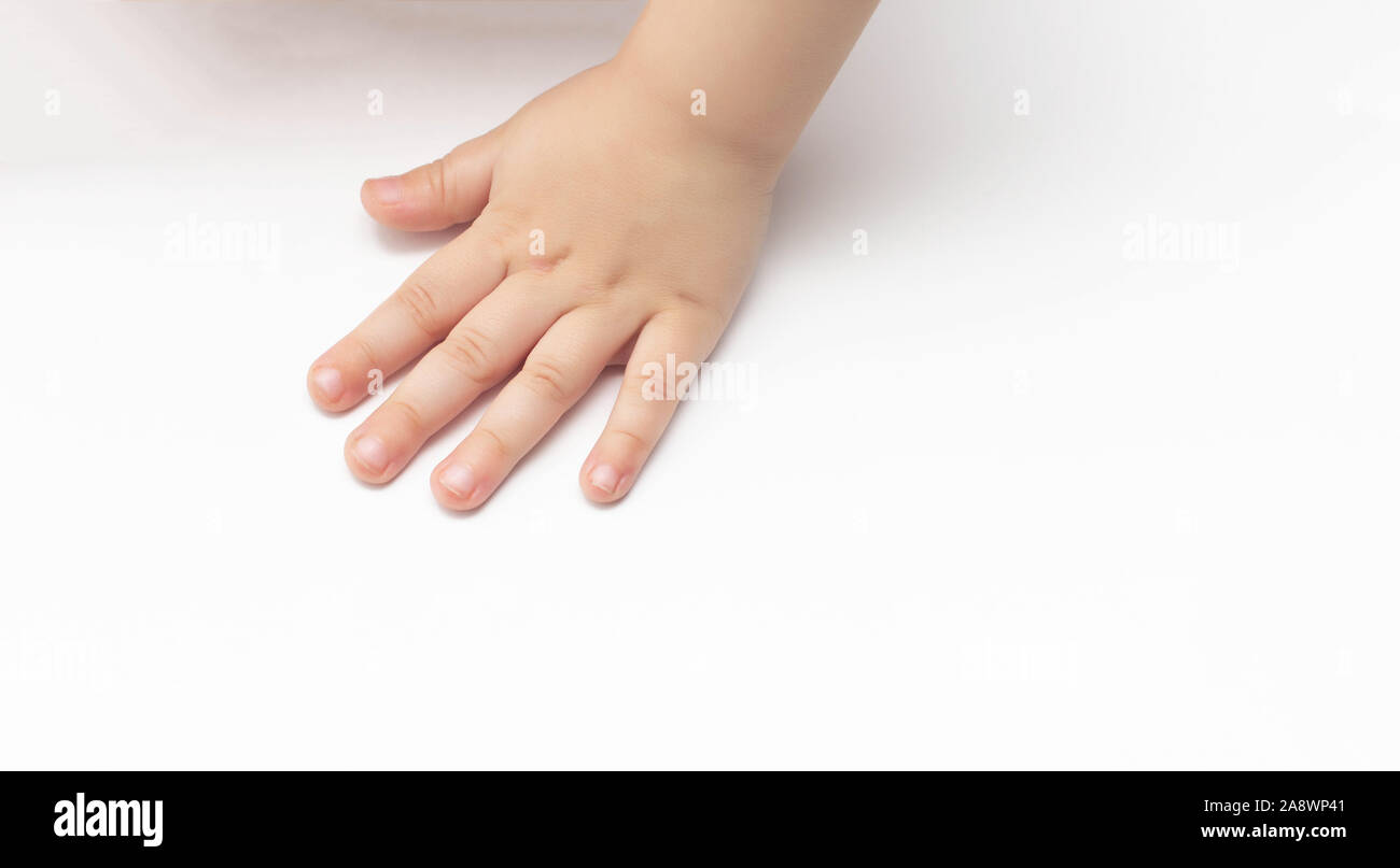 Children's little hand on a white background. The concept of children's ...