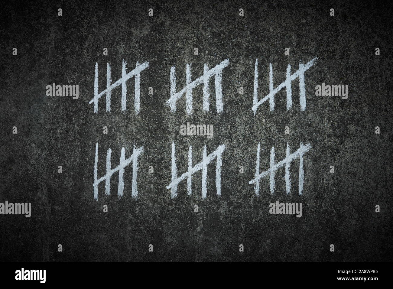 counting days in prison - handwritten lines of white chalk Stock Photo ...
