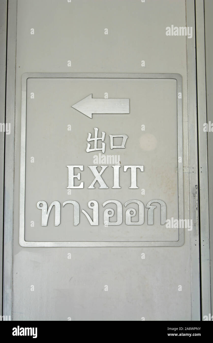 tri-lingual exit sign, in englsih, thai and chinese, at wat rong khun ...