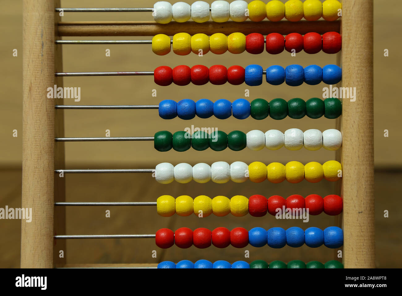 Children's colorful abacus for counting with multi-colored wooden beads ...