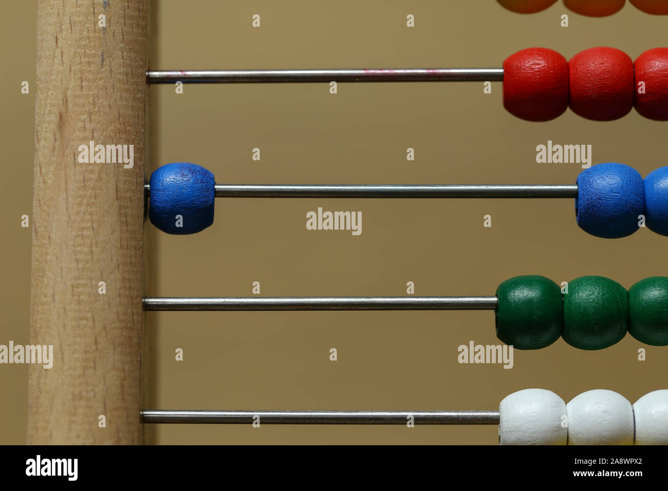 Children's colorful abacus for counting with multi-colored wooden beads ...