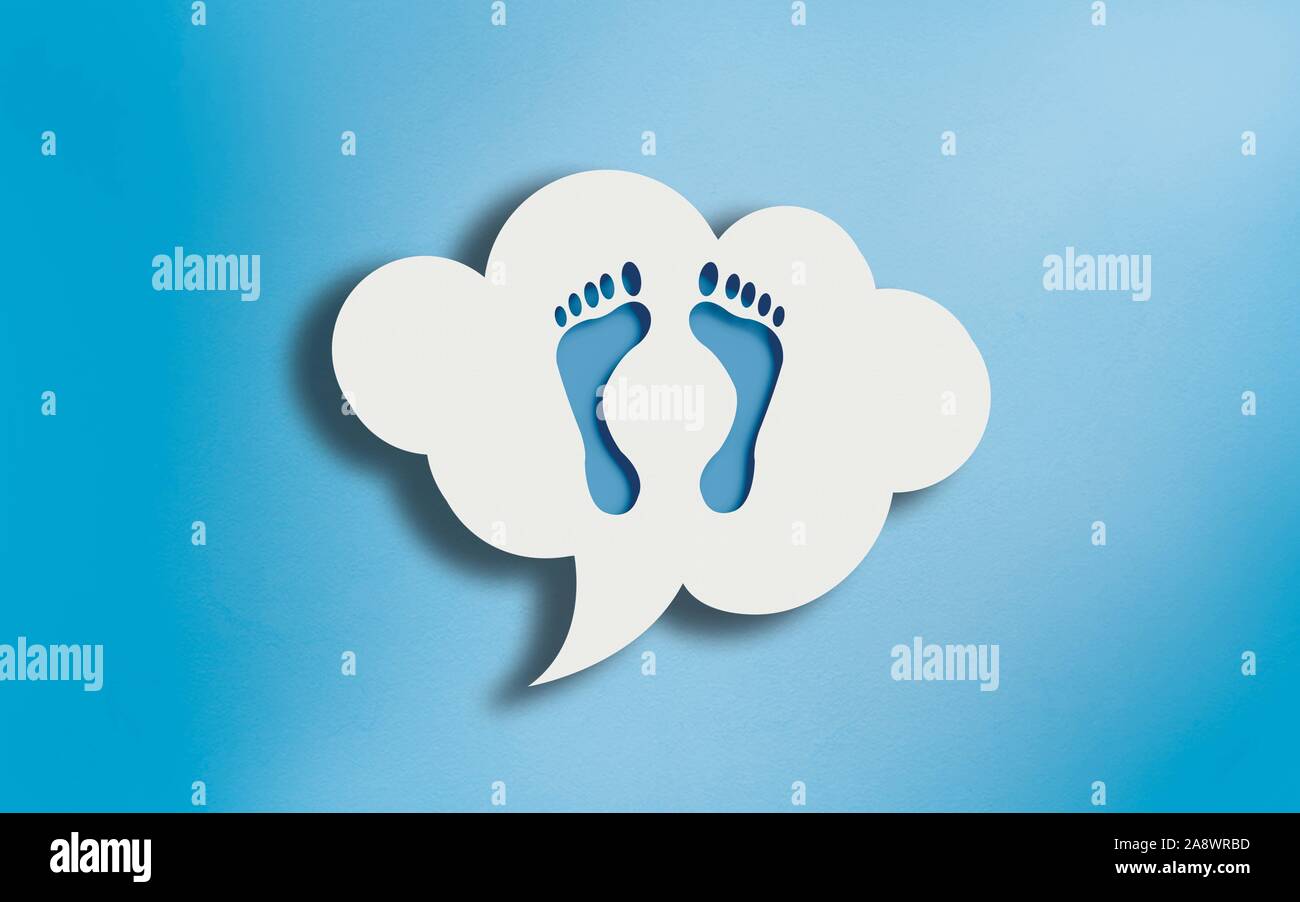 Cut out Footsteps icon in a cloud shape speech bubble on blue ...