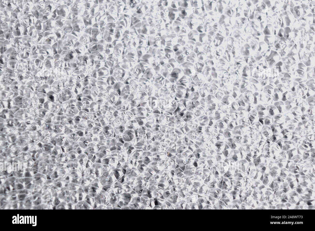 Abstract closeup macro foam surface texture with trapped air bubbles ...