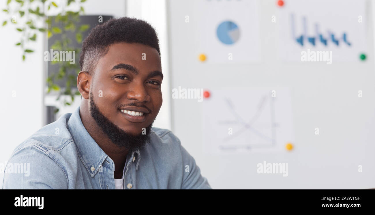 Closeup portrait of handsome black ceo at workplace in office Stock ...