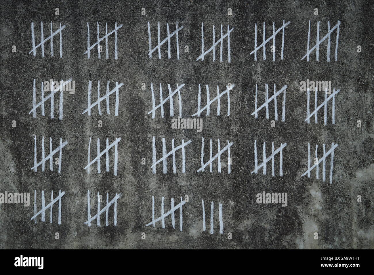 counting days in prison - handwritten lines of white chalk Stock Photo ...