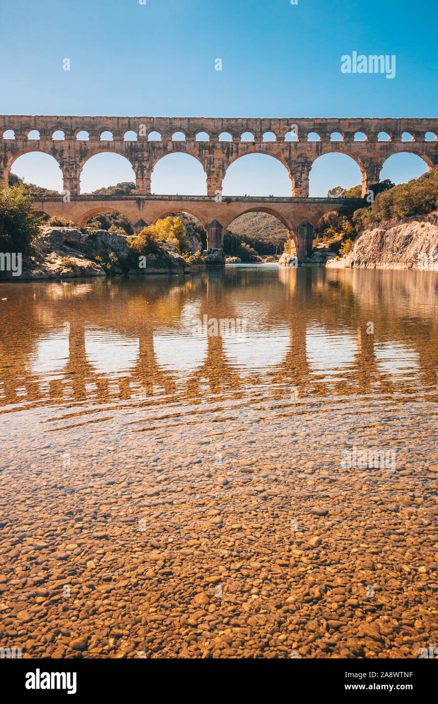 Beautiful view of the ancient Roman bridge Pont du Gard from the middle ...