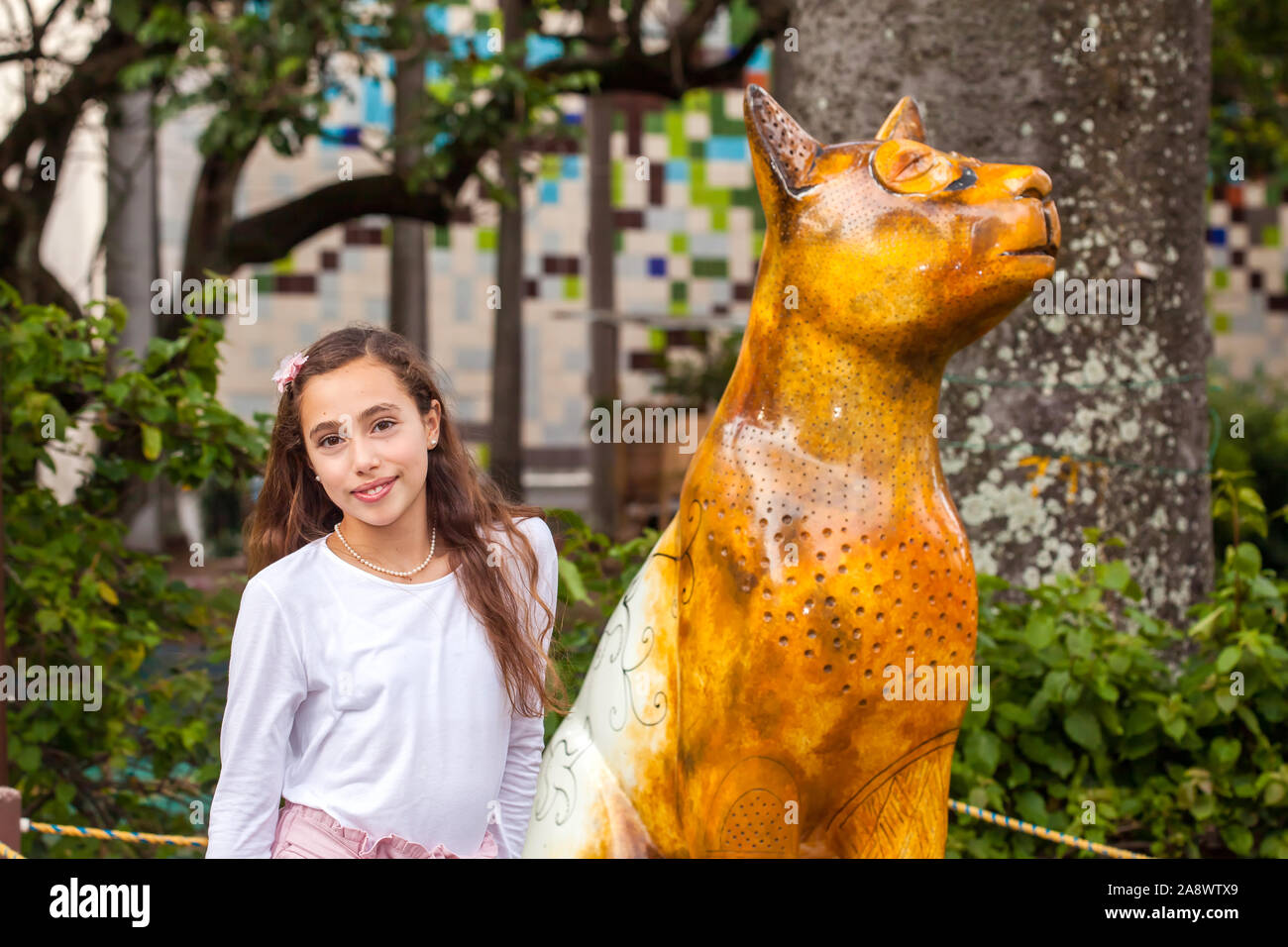 CALI, COLOMBIA - OCTOBER, 2019: Young girl tourist visiting the famous ...