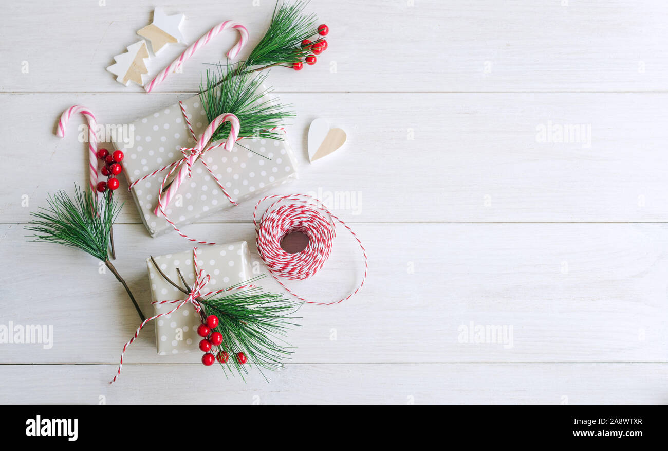 Christmas packaging background. Different wrap presents, fir tree ...