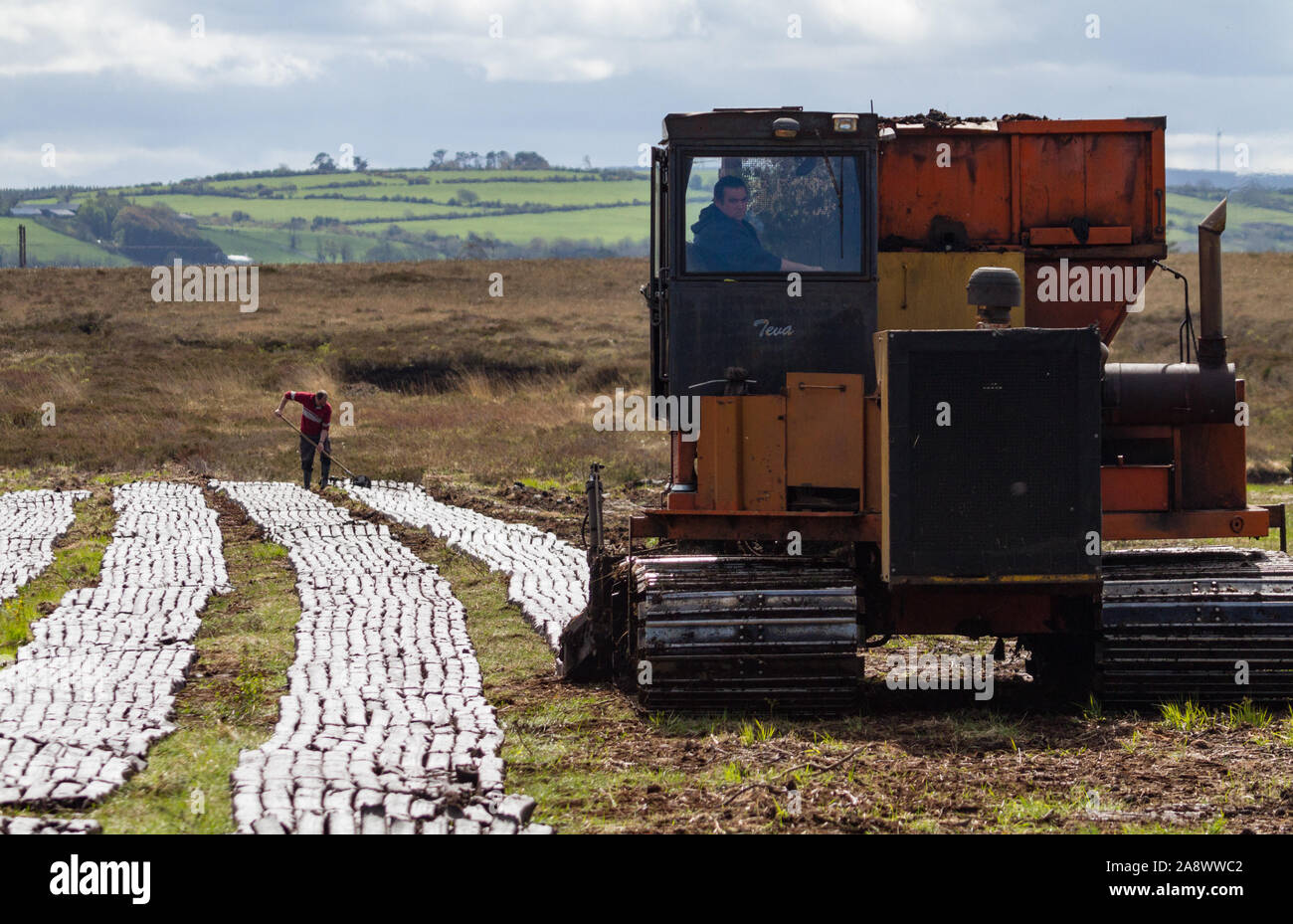 County Kerry, Ireland -30th April, 2019: Men and heavy machinery ...