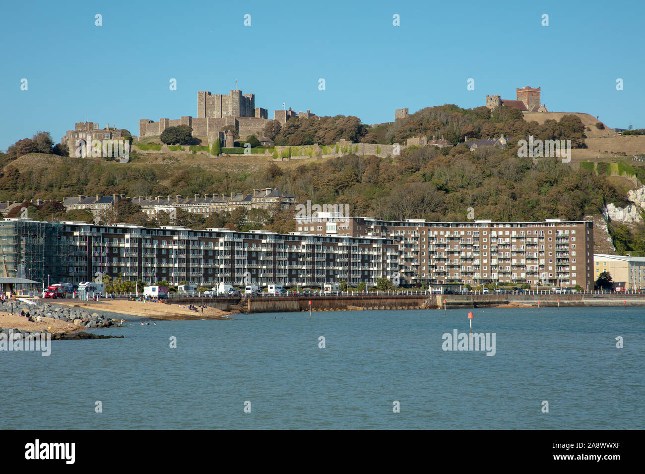 General view of Dover beach harbour, apartment blocks on the beach and ...
