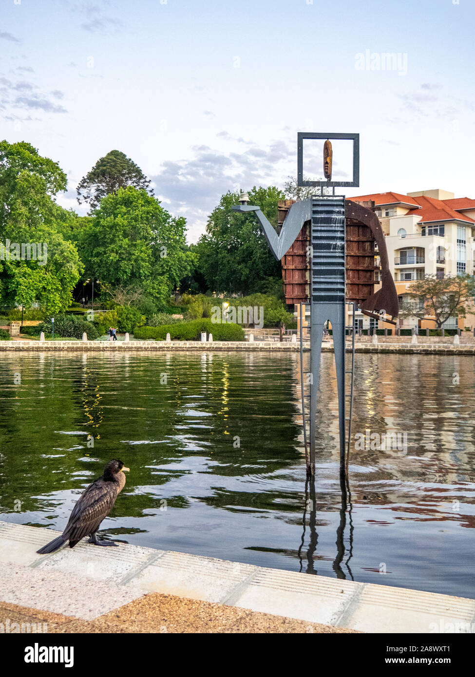 Cormorant or shag and sculpture Standing Figure by sculptor Tony Jones ...