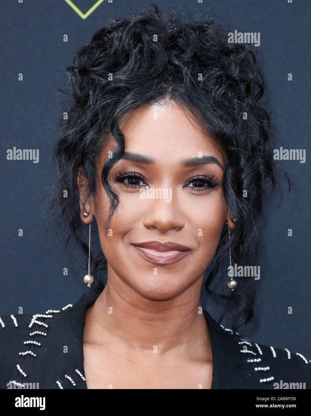 Candice Patton arrives at the 2019 E! People's Choice Awards held at ...