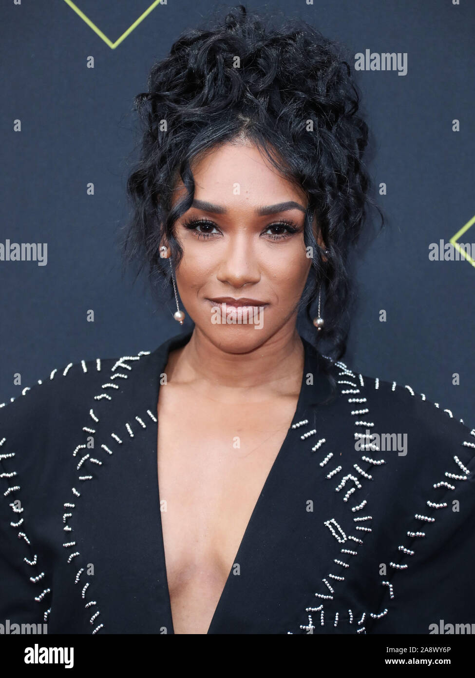 Candice Patton arrives at the 2019 E! People's Choice Awards held at ...