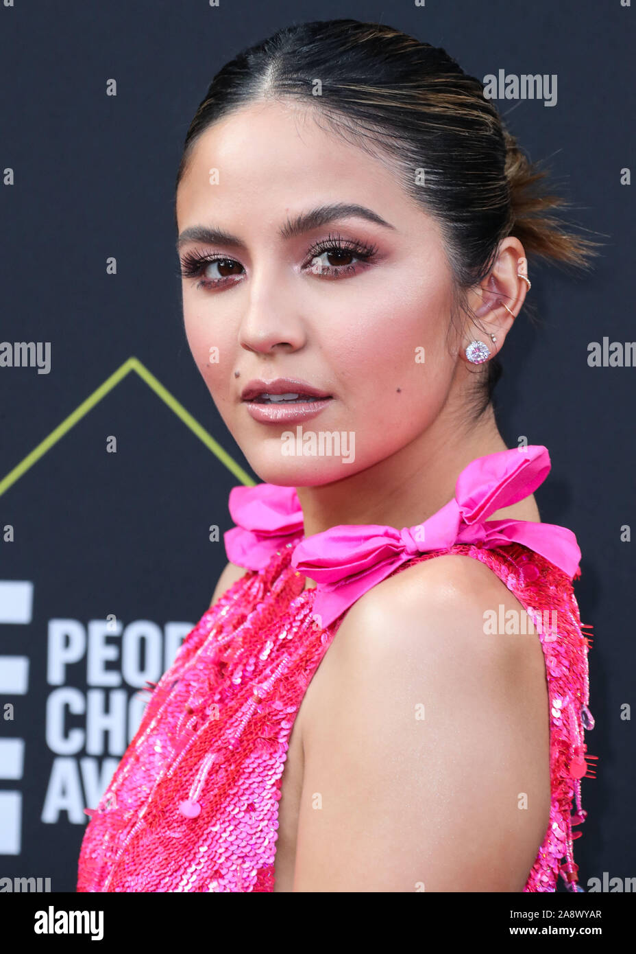 Erin Lim wearing Ashish arrives at the 2019 E! People's Choice Awards ...