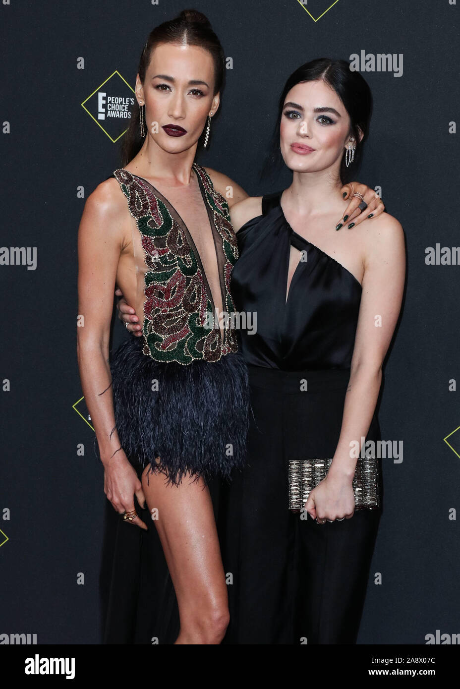 Actresses Maggie Q and Lucy Hale arrive at the 2019 E! People's Choice ...
