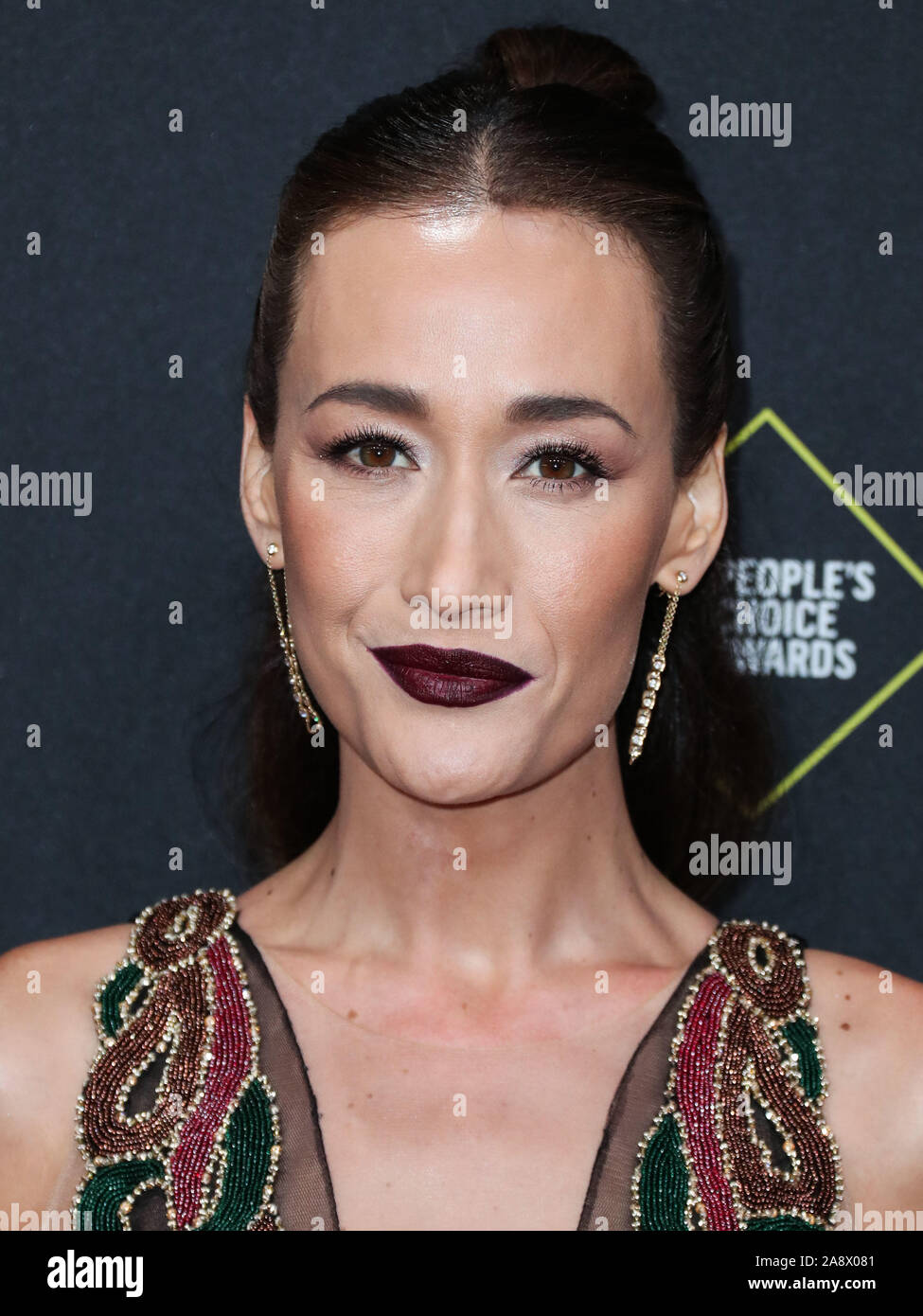 Actress Maggie Q wearing Sebastian Gunawan arrives at the 2019 E ...