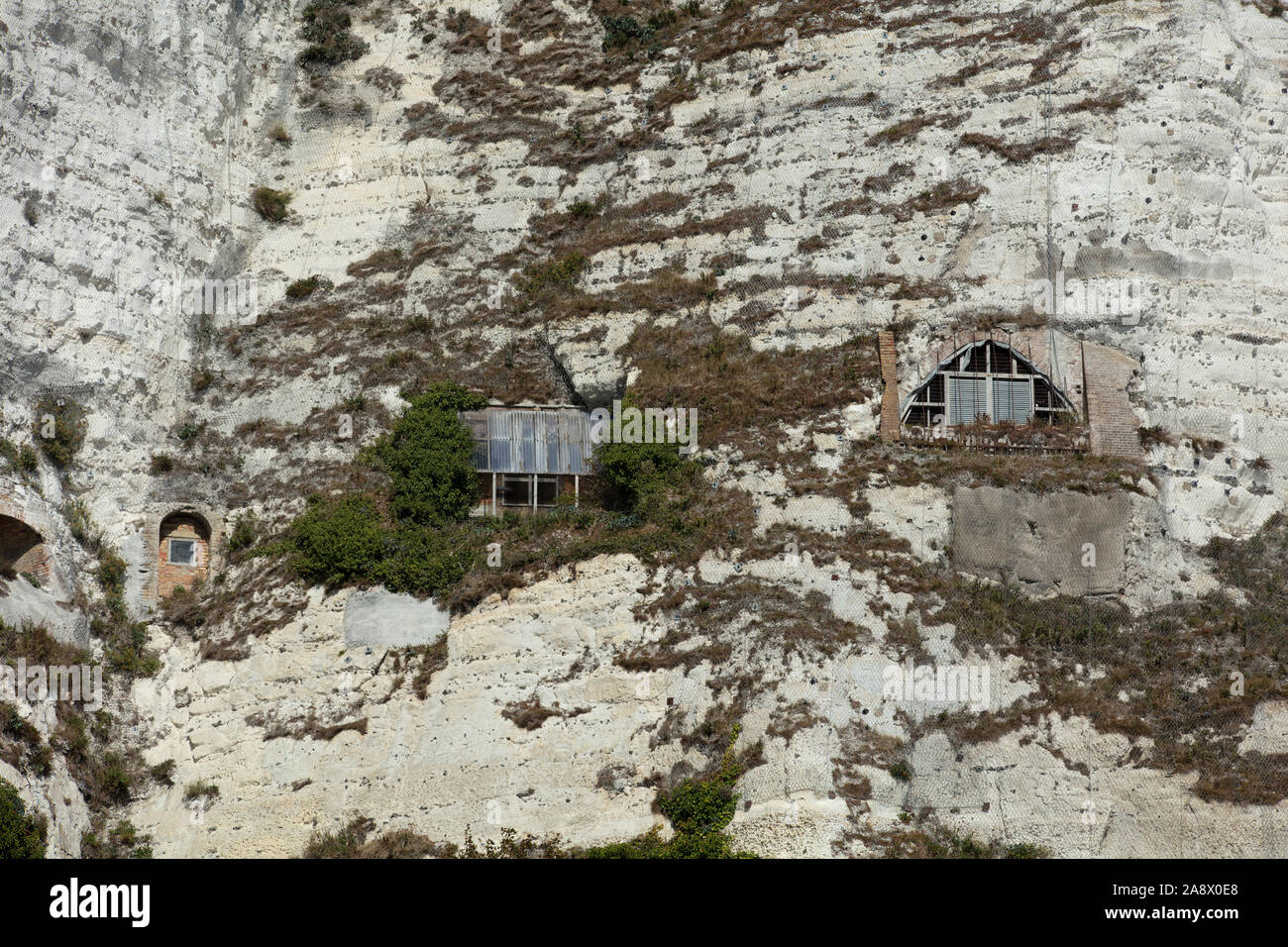 Windows seen in the White Cliffs of Dover, England, UK on a warm sunny ...