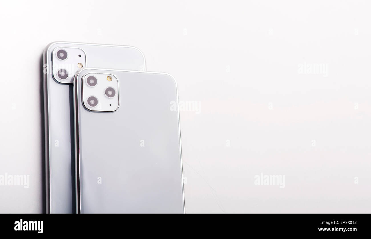 Two models of newest Iphone 11 models isolated on white Stock Photo - Alamy