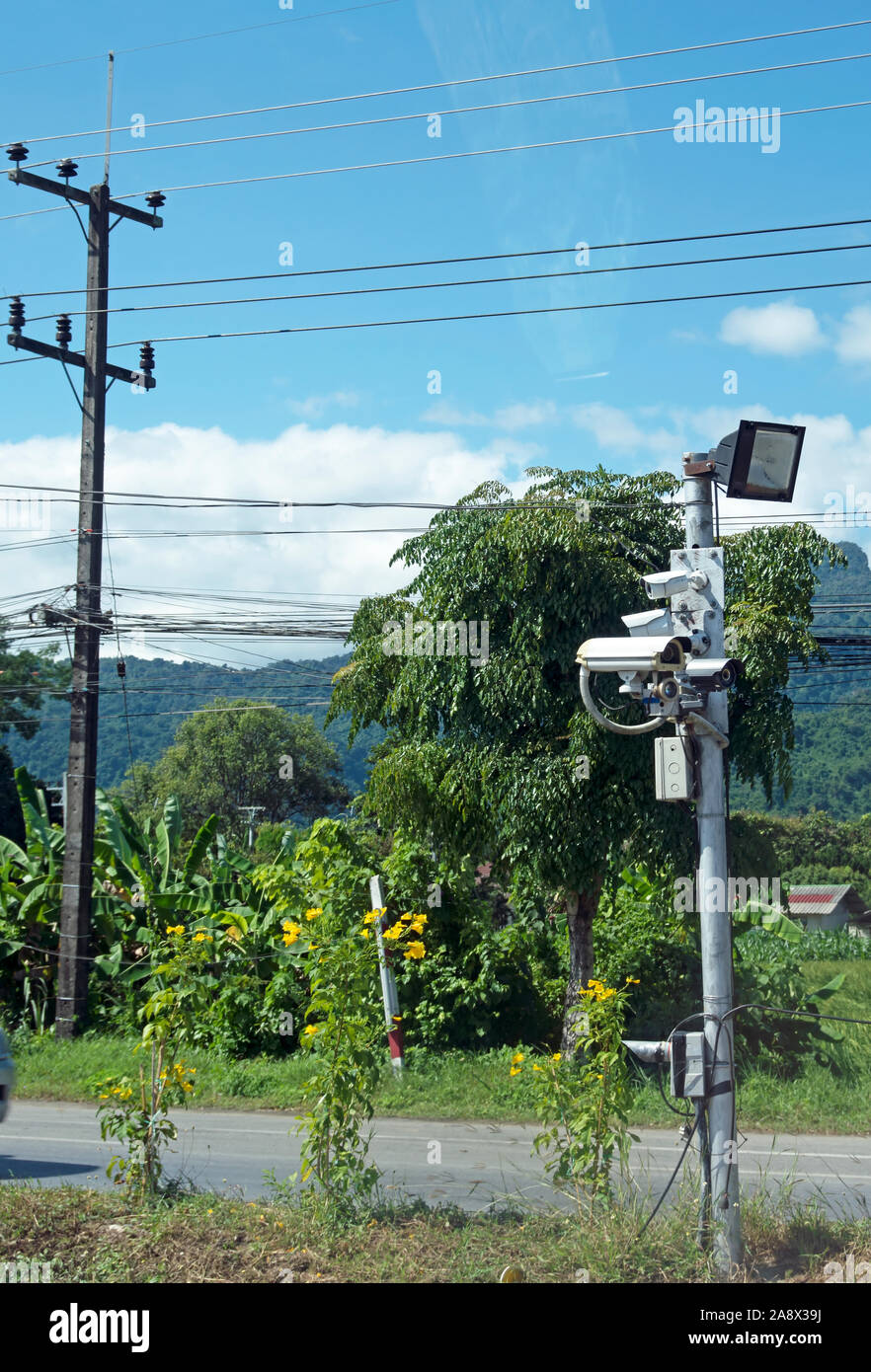 pole-mounted surveillance cameras and other equipment at an immigration ...